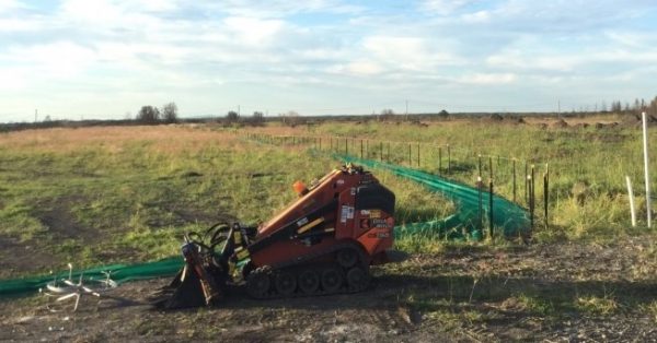 Silt Fence Installation in Action - DitchWitch Mini Skid Silt Fencing ...